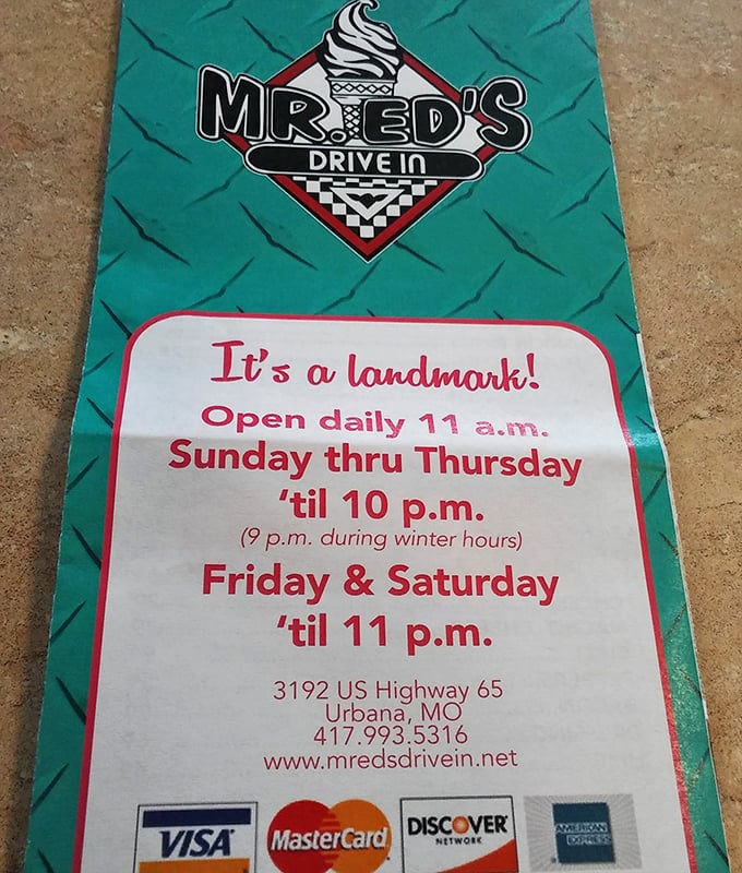 The menu proudly proclaims "It's a landmark!" – four words that tell you this isn't just a meal, but a piece of local history.