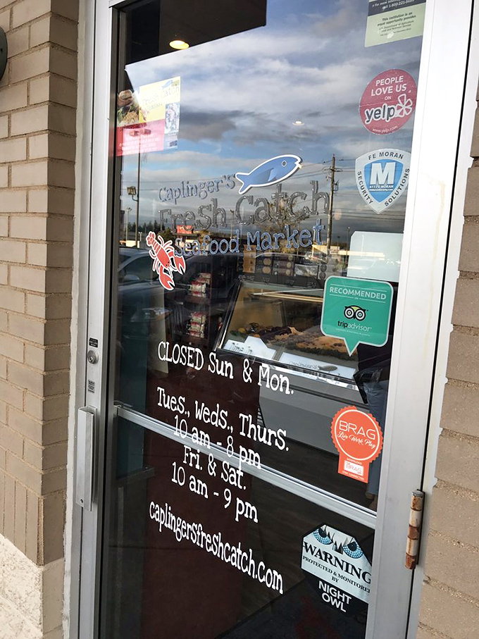 The door that tells you when happiness is available. Those hours aren't just information—they're your roadmap to seafood bliss.