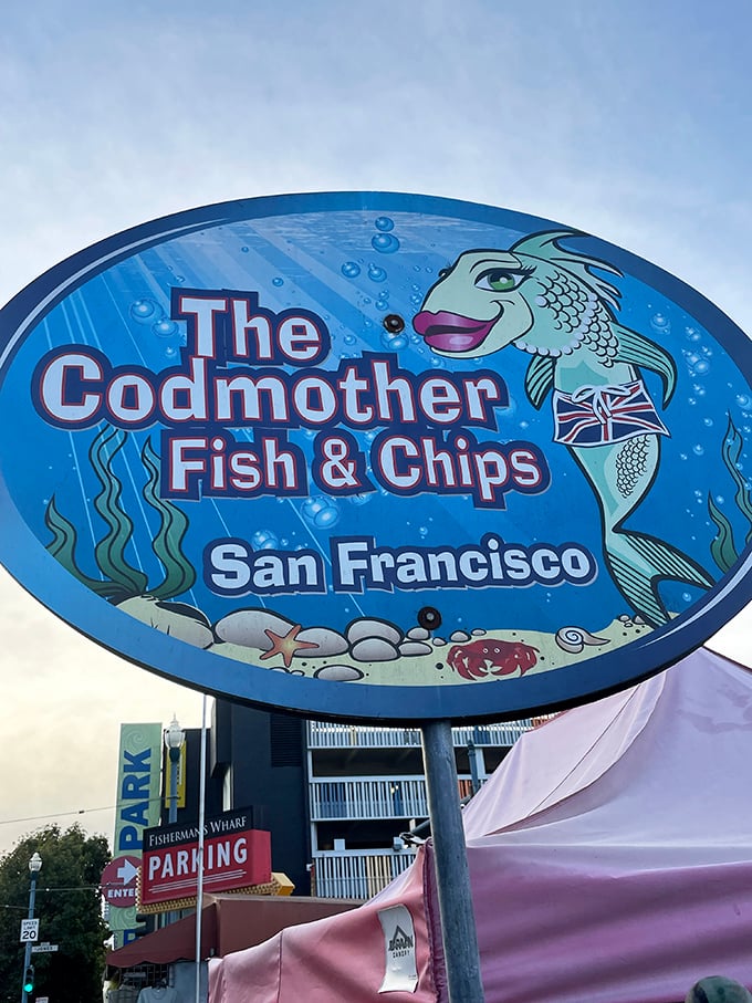 That smiling cartoon cod with its British bow tie tells you everything you need to know—this place doesn't take itself seriously, just its fish.