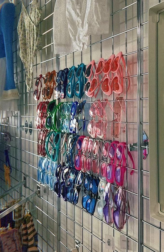 A rainbow of sunglasses awaits new faces. In Florida, these aren't just accessories—they're essential equipment for daily life.