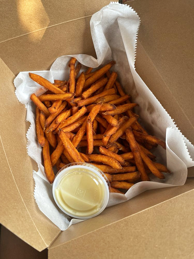 Sweet potato fries with more caramelized edges than a soap opera has plot twists.
