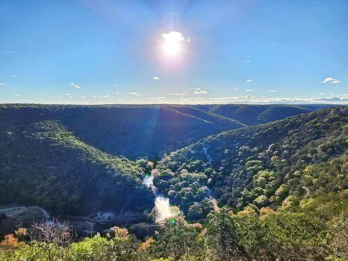 Sunlight dances on the valley floor like nature's own light show, proving everything really is bigger in Texas—including the vistas.