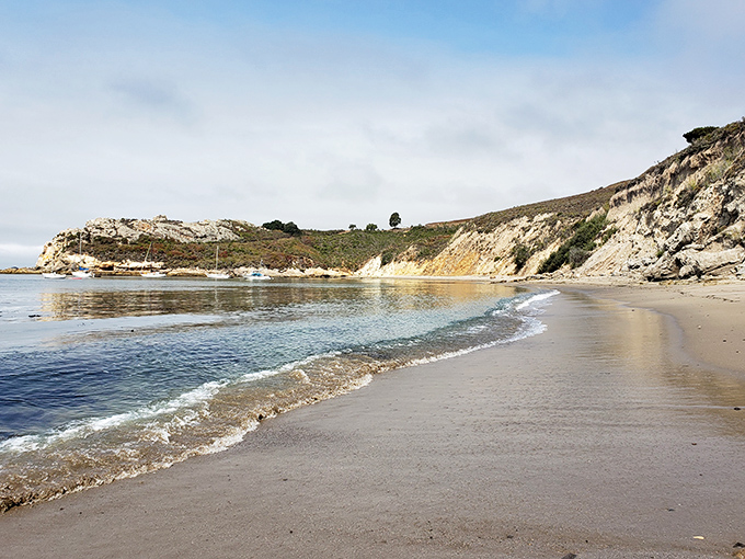 Gentle waves meeting pristine sand – the beach equivalent of that perfect first sip of morning coffee.