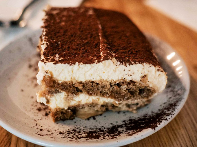 This tiramisu doesn't just end your meal—it provides closure so satisfying you'll want to write it a thank-you note.