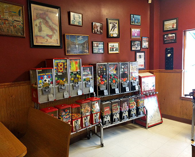 The wall of memories and toy machines creates that perfect nostalgic backdrop—where kids beg for quarters while adults reminisce about doing the same.