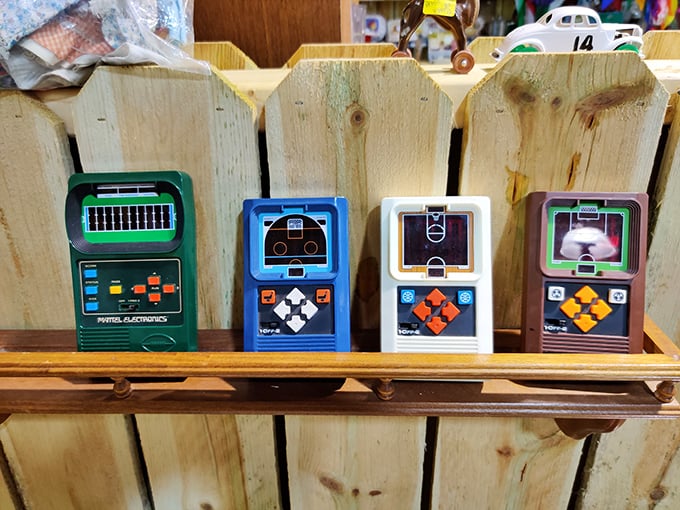Handheld electronic games from the 1980s—when "portable gaming" meant four buttons and LED lights that somehow represented football or basketball.
