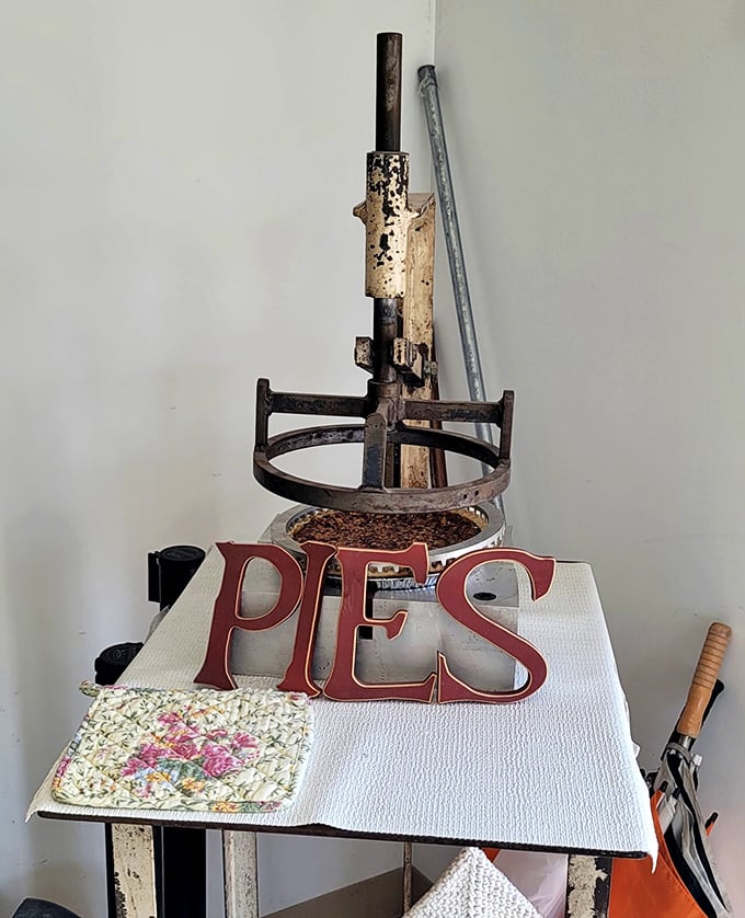 This vintage pie press isn't just equipment—it's a character in Mehaffie's story, seasoned with decades of delicious history.