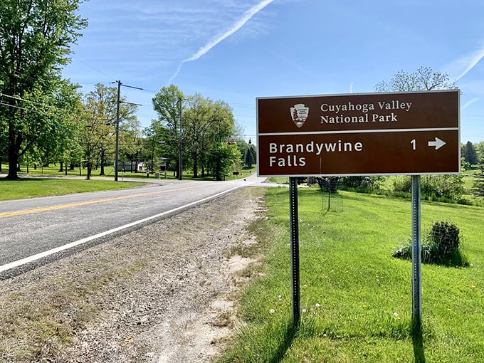 One mile to natural wonder! This sign doesn't just point the way—it promises an experience worth every step of the journey.