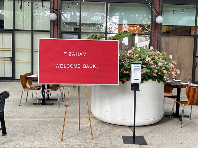 Welcome Back! says the sign, but what it really means is "Get ready for another memorable meal."