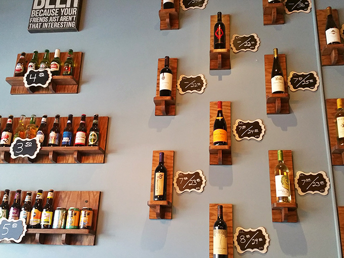 The wall of wine and beer—because nothing complements the fruits of the sea quite like the fruits of the vine.