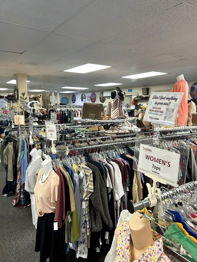 The women's section is meticulously organized—a testament to the care taken in presenting secondhand clothing with first-rate respect and attention.