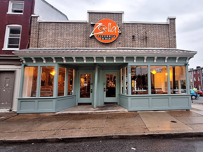 Zella's mint-green storefront brightens the corner like their pizzas brighten your day – with unexpected charm. 