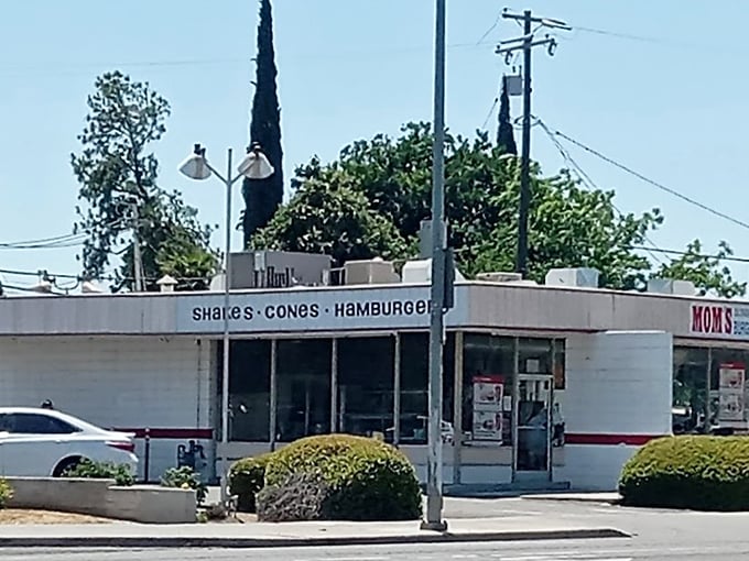 Behind these windows, Mom's serves nostalgia on a bun – classic burgers that remind you why sometimes the simplest things are the most satisfying.