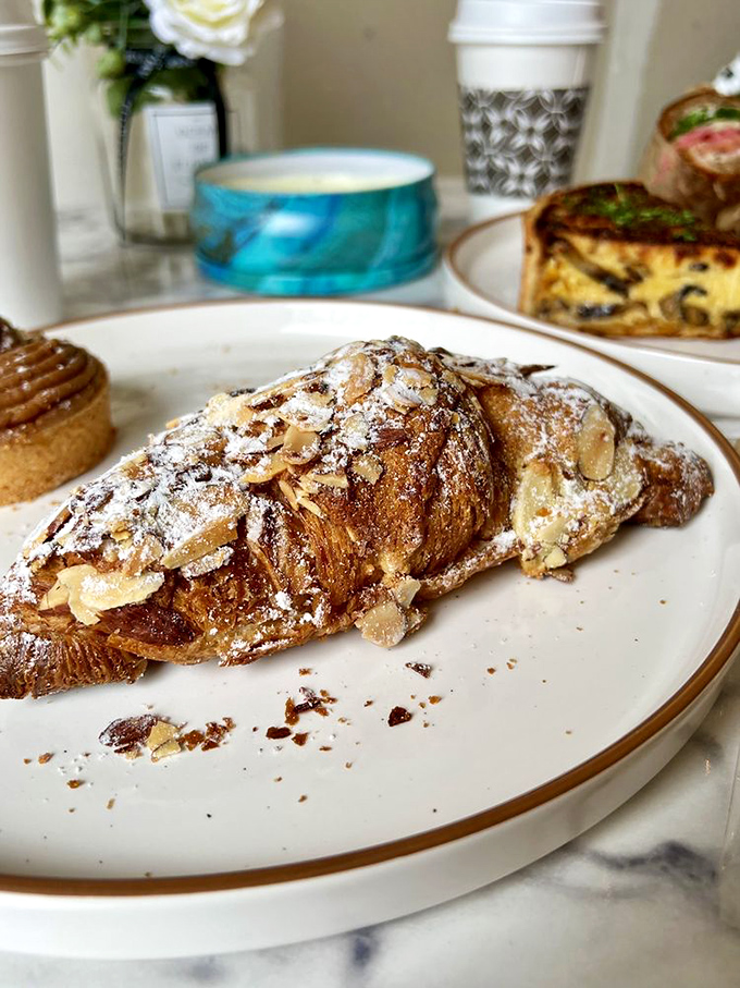 The almond croissant that could convert even the staunchest anti-nut person – flaky, nutty perfection achieved.