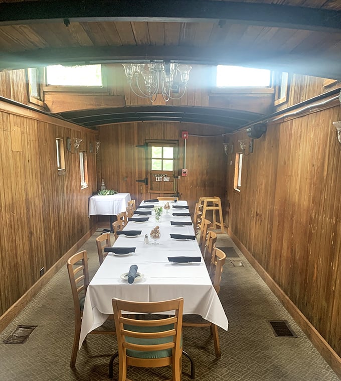 Dining in what appears to be a converted train car—because sometimes the journey to deliciousness should feel like an actual journey.