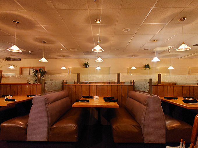 Comfortable booths designed for serious eating business—where napkins on laps aren't just polite, they're strategic planning for the delicious journey ahead. 