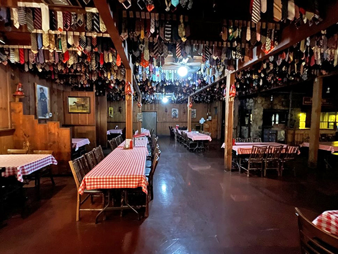 Neckties hang like trophies from the ceiling—each one representing a visitor who learned the "no fancy dress" rule the hard way.