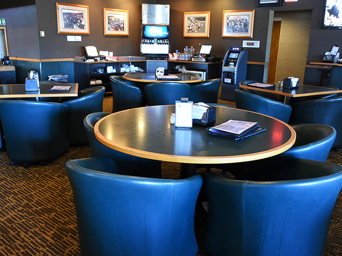 Blue chairs and round tables—the perfect setting for debating the greatest Packers quarterbacks while demolishing a basket of curds.
