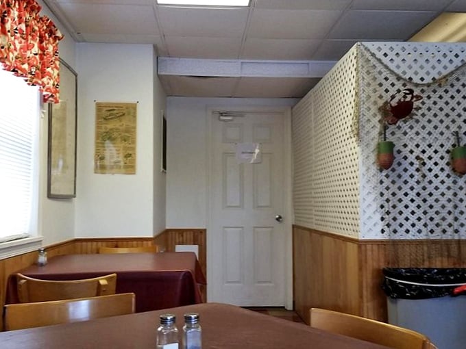 Wood paneling and simple tables say "focus on the food." This isn't Instagram bait—it's the real deal for people who know what matters.