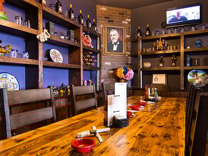 The private dining area offers rustic elegance with a touch of tequila sophistication. Those wooden shelves aren't just storage—they're a liquid library of agave excellence.