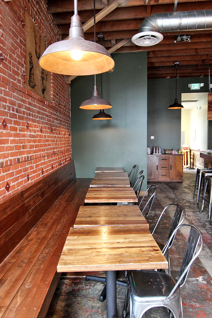 Simple wooden tables against brick walls – because when the food is this good, you don't need fancy surroundings to distract you.