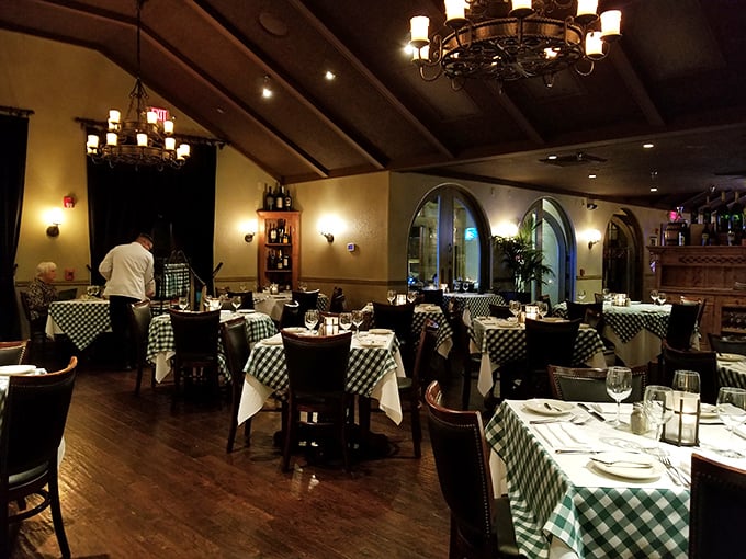 Evening transforms the dining room into an intimate escape, where warm lighting flatters both the food and the diners.