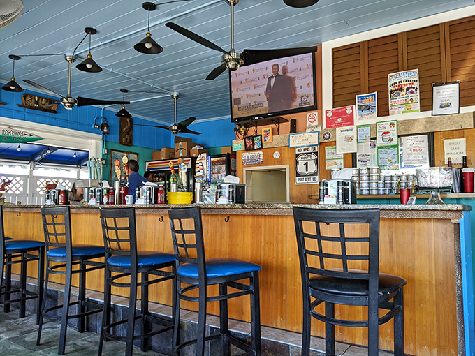 The bar area—where locals gather to share fishing tales that grow taller with each cold beverage served.