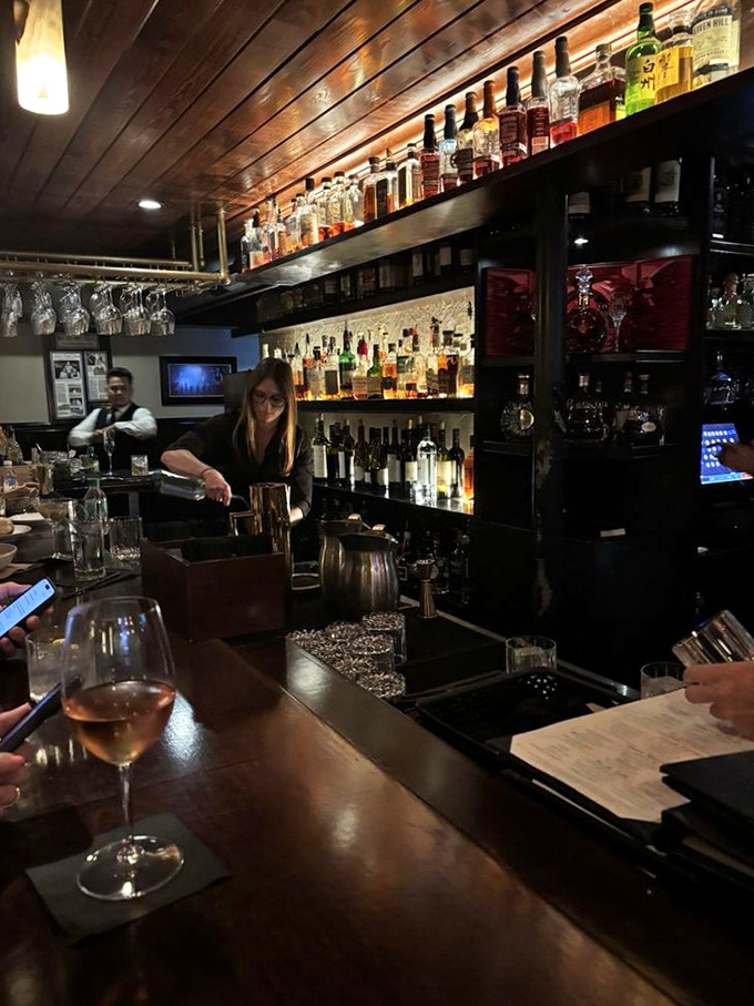 A well-stocked bar where your Old Fashioned gets the respect it deserves – Don Draper approved.
