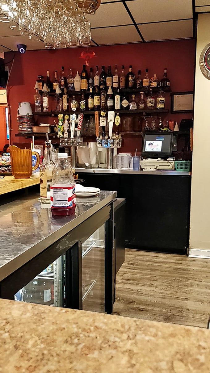 The bar stands ready like a liquid library, where the bartenders are the knowledgeable librarians of libation literature.