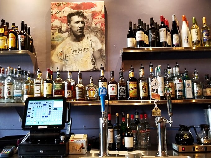 The bar doesn't just serve drinks—it serves as a museum of spirits, with bottles arranged like artifacts of a particularly delicious civilization.