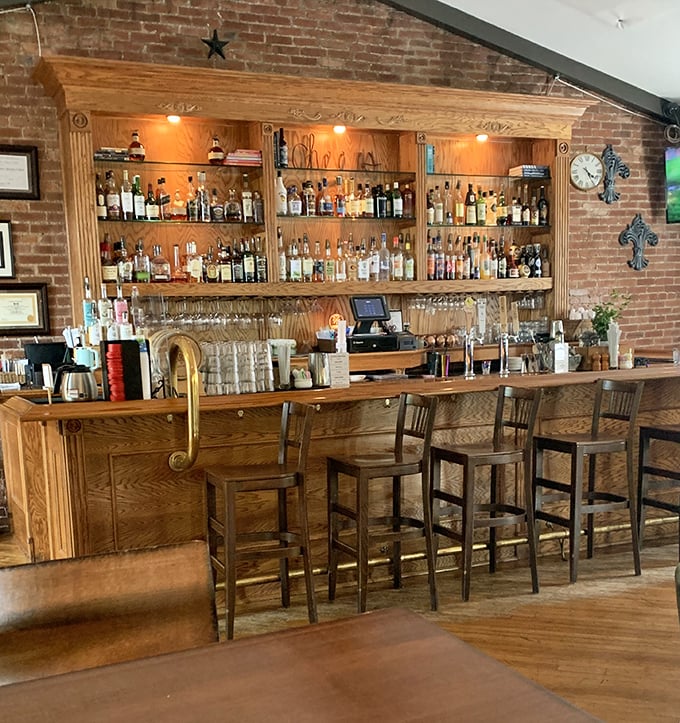 Not just a bar, but a liquid library with wooden shelves holding spirits for every mood and occasion—from celebration to contemplation.