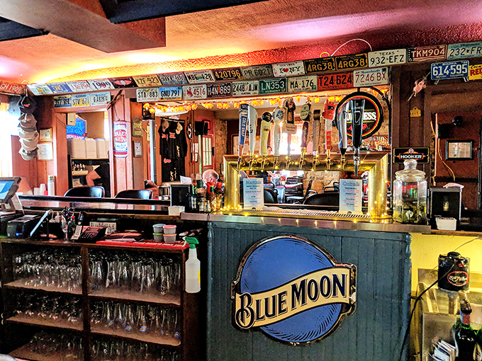 The bar area, crowned with vintage license plates and Blue Moon signage, feels like the kind of place where everybody might not know your name—yet.