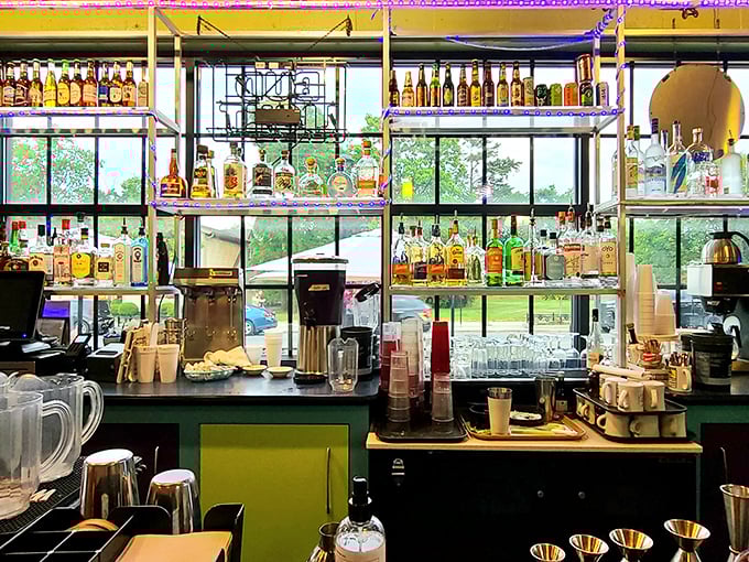 The bar that promises liquid sunshine – a colorful array of bottles standing at attention, ready to transform your ordinary Tuesday into something special.
