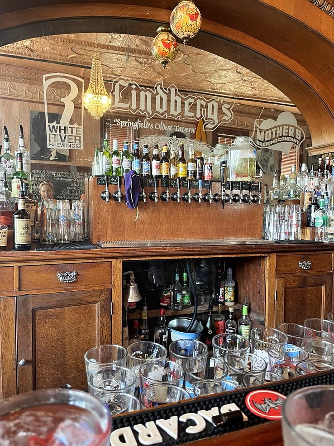 Behind the bar, endless possibilities. "Springfield's Oldest Tavern" proudly displays its craft beer taps and spirits, promising libations for every palate.