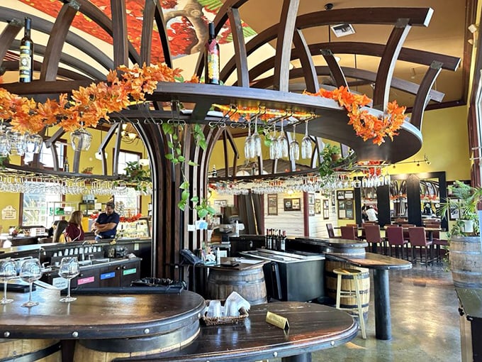 The circular wine bar isn't just functional—it's a stage where glasses dangle like crystal performers waiting for their moment to shine.