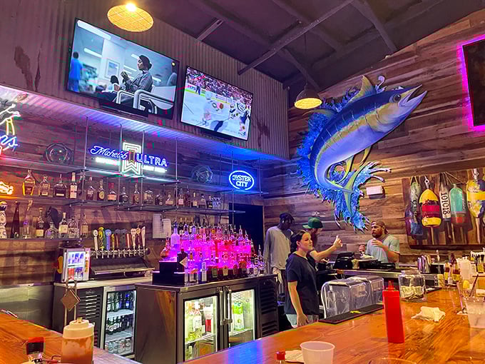 The bar area isn't just serving drinks—it's hosting a nightly celebration where that mounted marlin has seen it all but tells no tales.