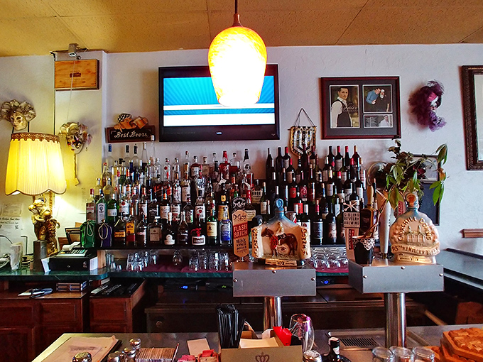 A bar stocked for serious business. This isn't amateur hour—this is where proper Italian-American drinking traditions are maintained with religious devotion.
