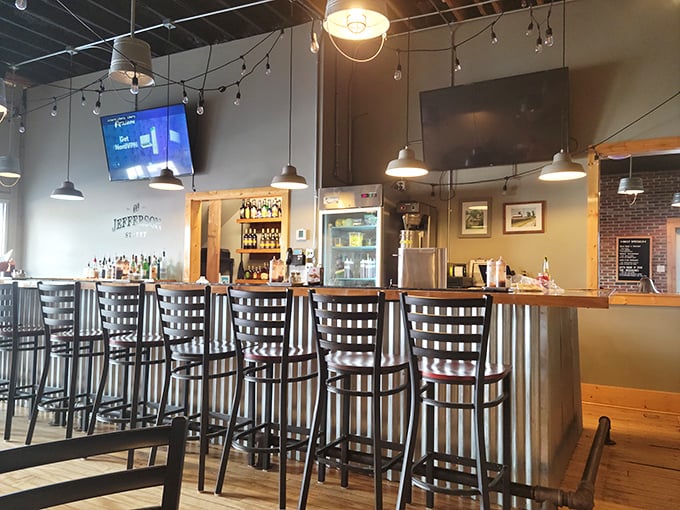 The bar area isn't just for drinks—it's command central for barbecue operations, where bourbon and beer find their perfect meat matches.