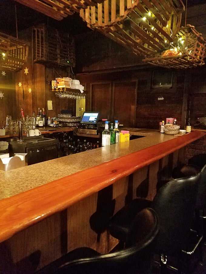 Wooden lobster traps hanging from the ceiling aren't just decoration – they're a promise that this place takes its seafood seriously.