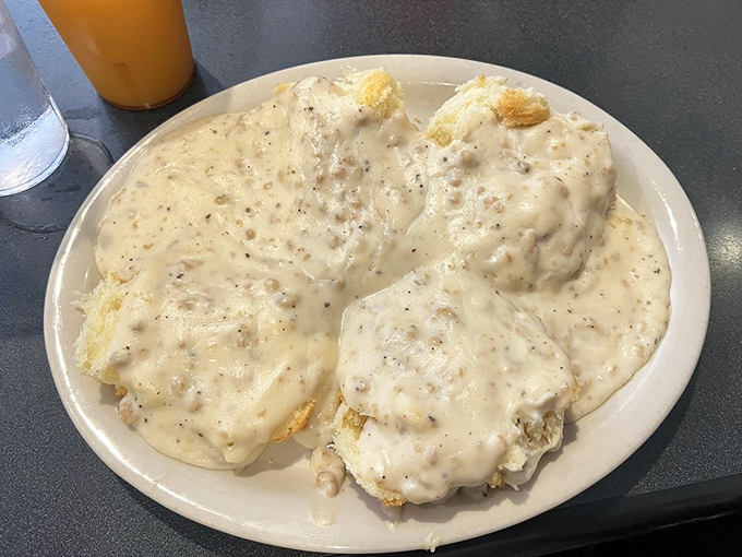 Biscuits and gravy that could settle family feuds. This plate doesn't just feed your body—it nourishes your Midwestern soul. 