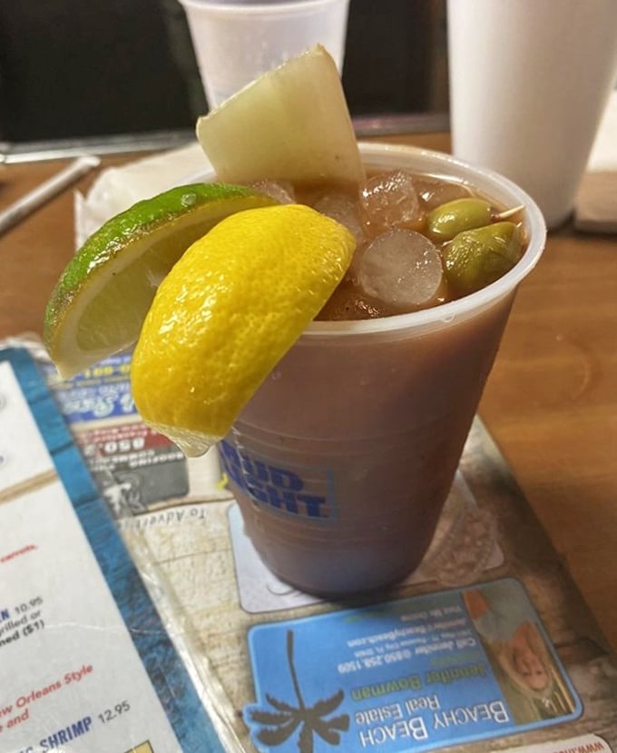 A Bloody Mary garnished with enough fixings to qualify as both cocktail and appetizer course.