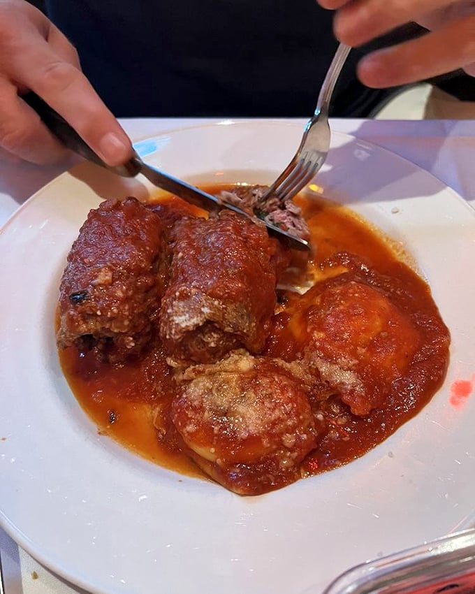 Braciole that doesn't just fall apart with your fork—it practically leaps onto it, eager to introduce itself to your taste buds.