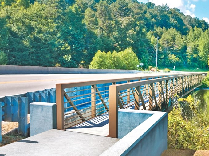 This unassuming bridge connects more than just riverbanks—it's a gateway to hiking trails where nature puts on a show that doesn't require tickets.