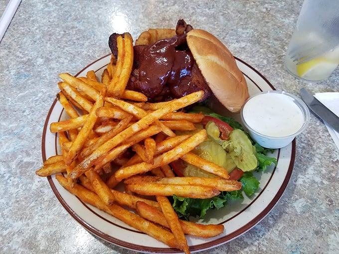 The burger-fries combo that reminds you why classics became classics—no foodie trends required, just honest-to-goodness satisfaction on a plate.
