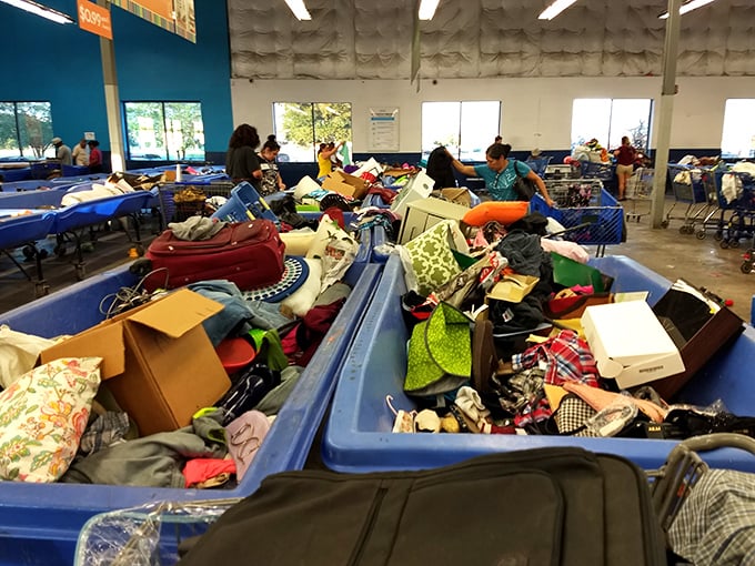 Organized chaos at its finest. The thrill of the hunt keeps these shoppers focused amid a whirlwind of potential finds.