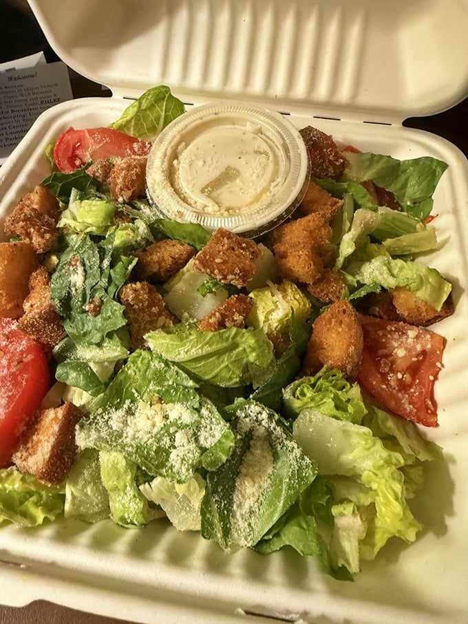 Caesar salad: the token vegetable portion of your meal. Crisp romaine, crunchy croutons, and creamy dressing—technically it counts as eating healthy.