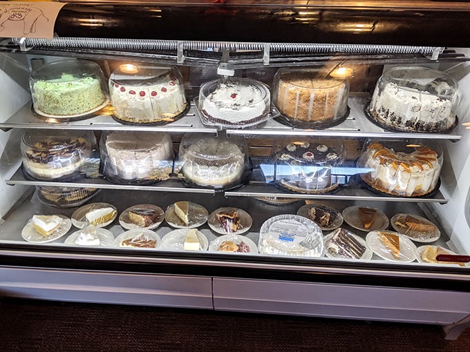 The dessert case—where willpower goes to die and "I'll just have a bite of yours" becomes the biggest lie of the day.