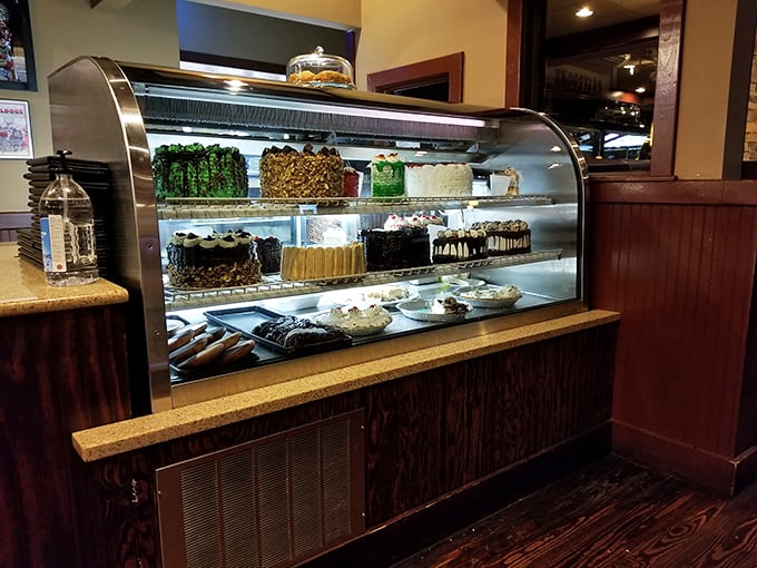 The dessert case—where willpower goes to die and "I'll just have a bite" becomes the lie we tell ourselves.