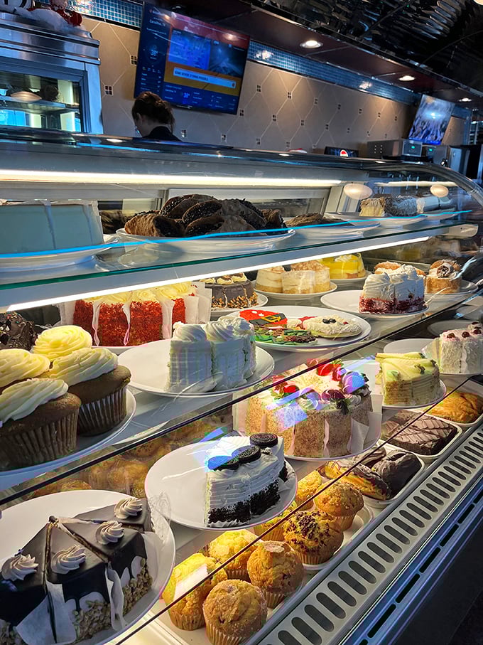 The dessert case – where willpower goes to die and "I'll just have coffee" turns into "Well, maybe just a slice of that chocolate cake."