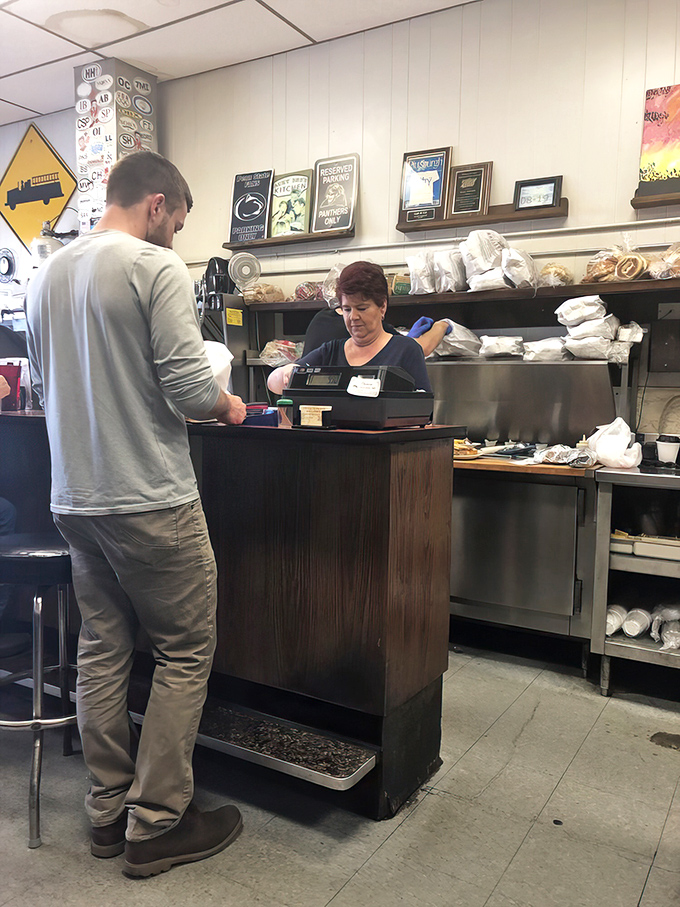 The exchange of cash for comfort food – a transaction as old as time and still the foundation of neighborhood dining at its most authentic.